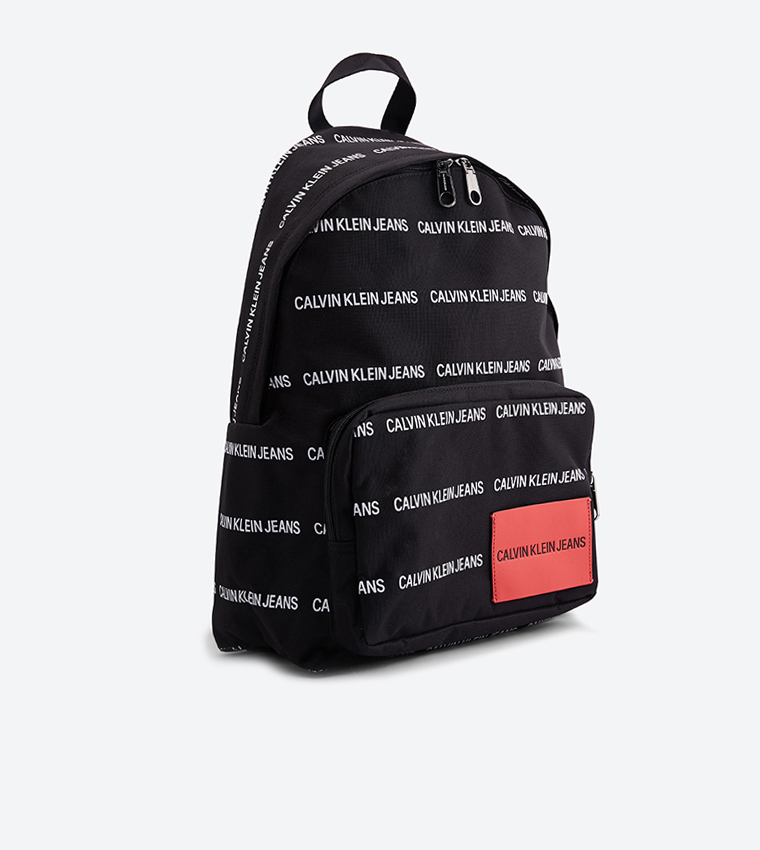 Buy Calvin Klein Top Hook Logo Marquee Printed Backpacks Black In Black ...