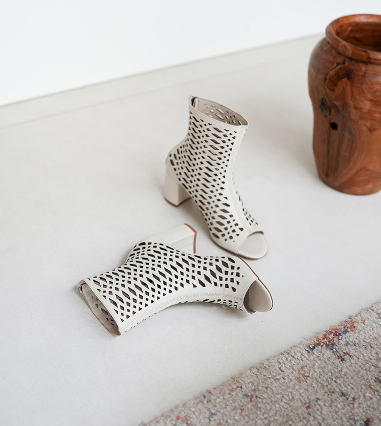 Buy Thuna KAYAN Cut Out Heel Sandals In Beige | 6thStreet Kuwait