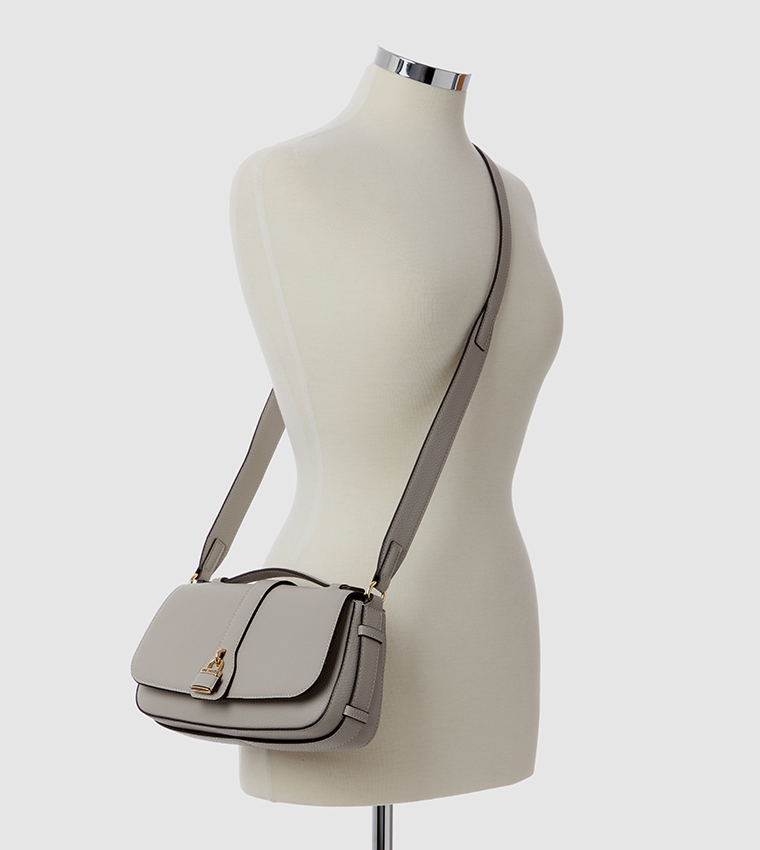Buy Nine West SHIRIN Textured Flap Crossbody Bag In DOVE | 6thStreet UAE
