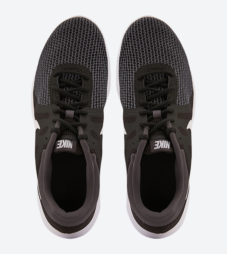 اشتري نايك Revolution 4 Eu Round Toe Sneakers Black بلون أسود | 6ستريت ...