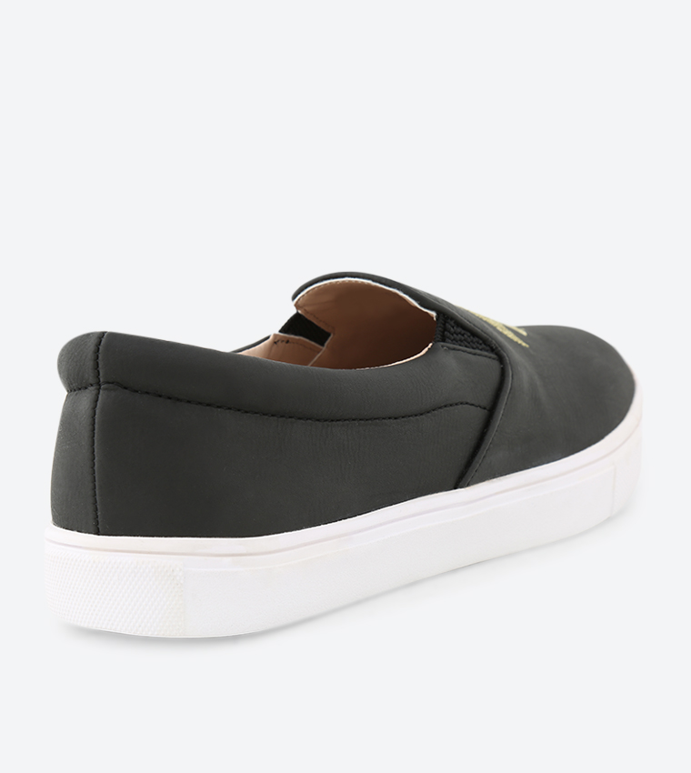 Buy Juicy Couture Eleave Slip Ons Black In Black | 6thStreet Kuwait