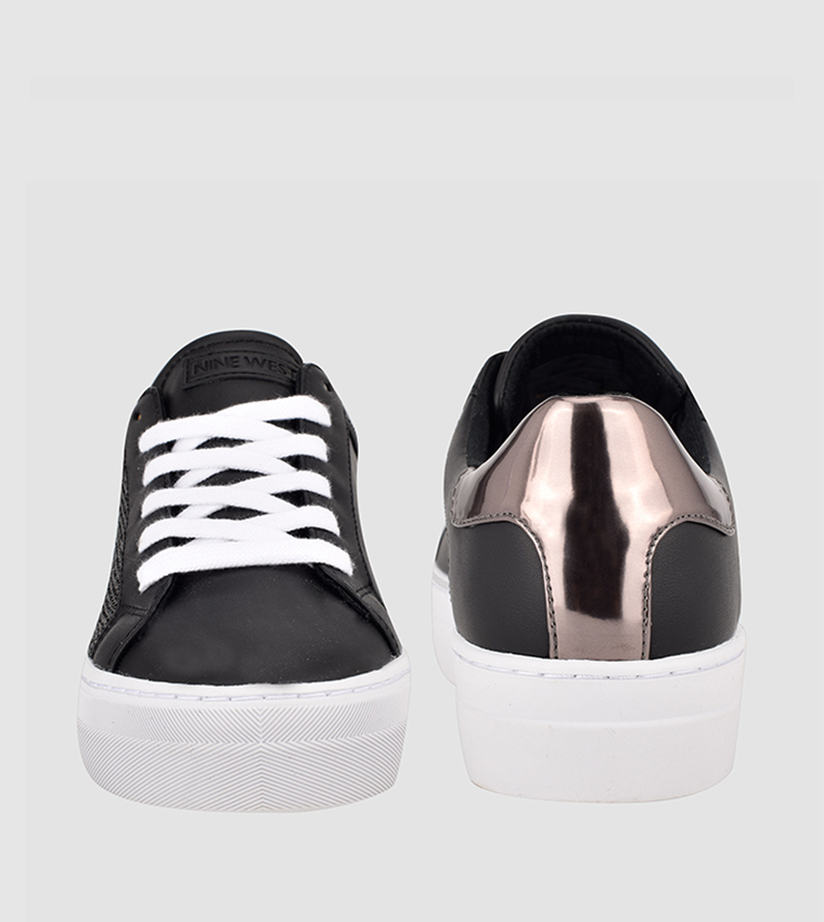 Buy Nine West Flat Syn Sneaker Black In Black | 6thStreet Oman